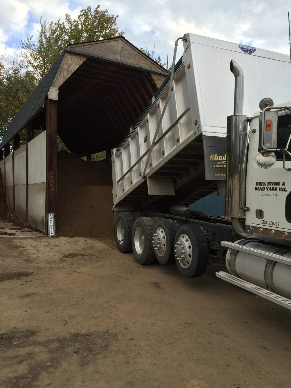 Our Dump Trucks and Flatbed Trucks for Your Product Delivery - Rock ...